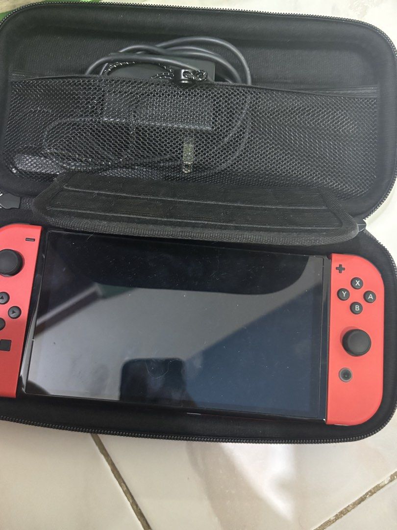 NINTENDO SWITCH MARIO OLED (changed price due to value and add ons ...